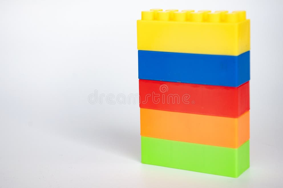 Hand Stacking Up Lego Set with Customizable Space for Text Stock Photo ...
