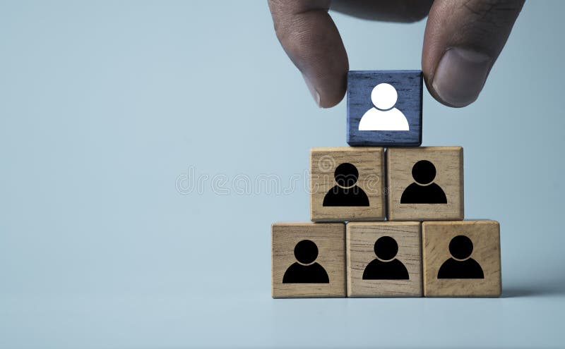 Hand Stacking White Human Icon on the Top of Black People Icon for ...