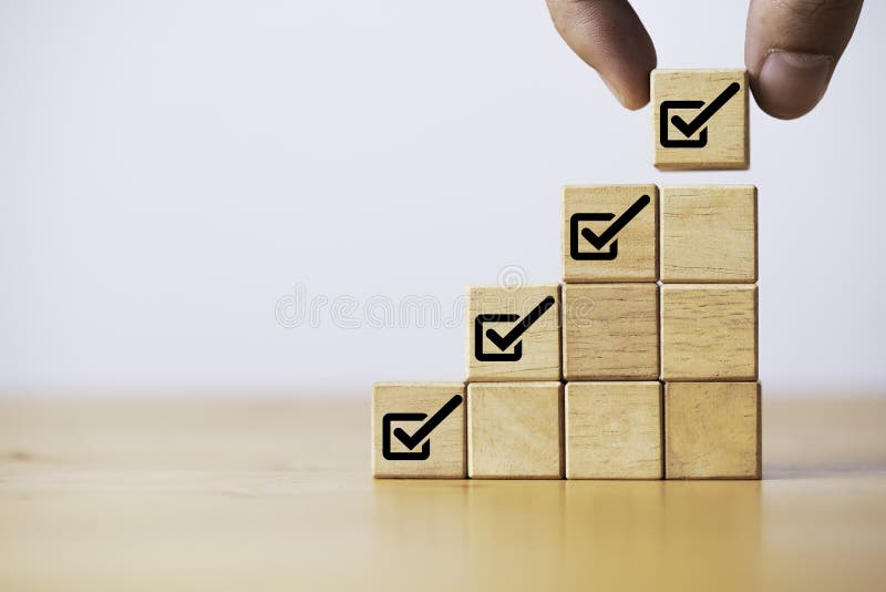 Hand Stacking Wooden Block Cube with Correct Tick Sign Symbol for ...