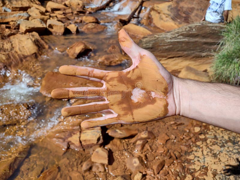 Hand stained with clay stock image. Image of rock, geology - 229713563