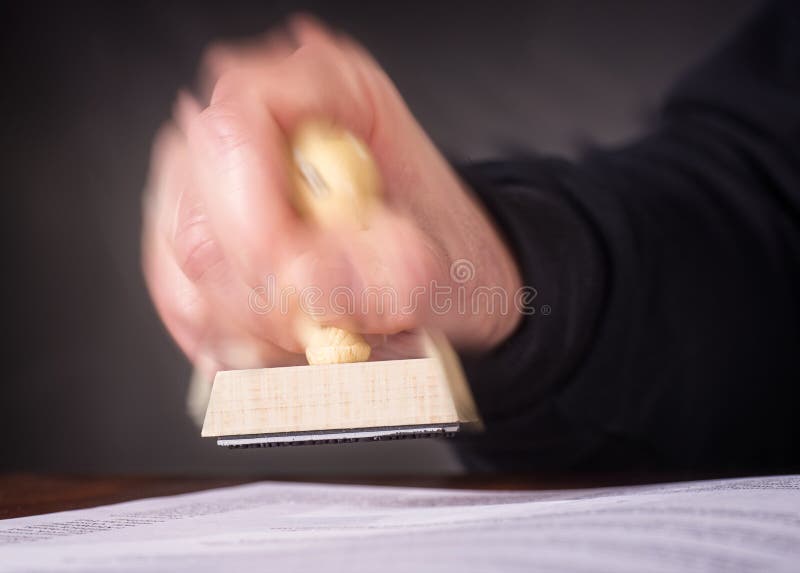 Hand with stamp stock photo. Image of authority, document - 108707014