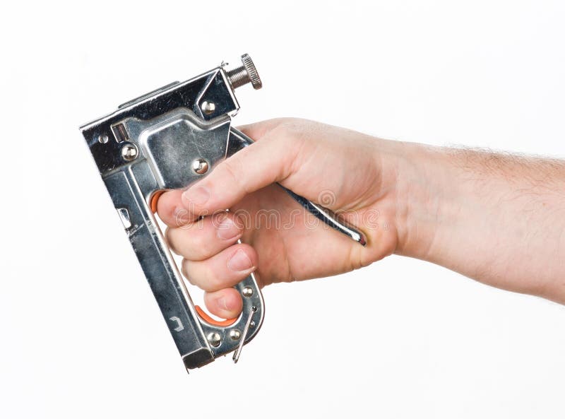 Hand with staple gun stock image. Image of home, male - 21723185