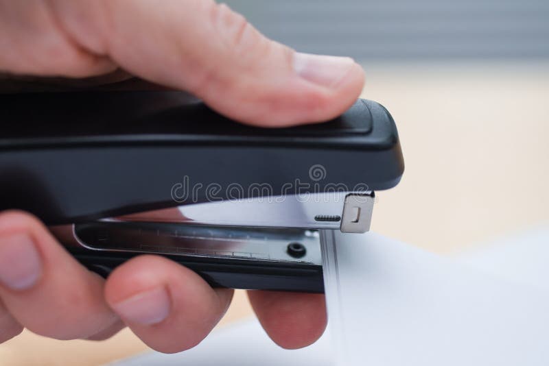 Hand Staples Paper on Table in Office Stock Image - Image of staples ...