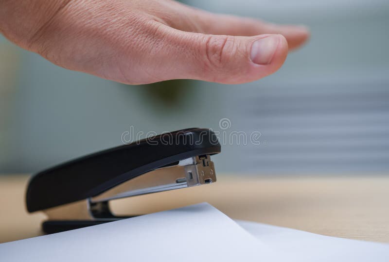 Hand Staples Paper on Table in Office Stock Image - Image of table ...