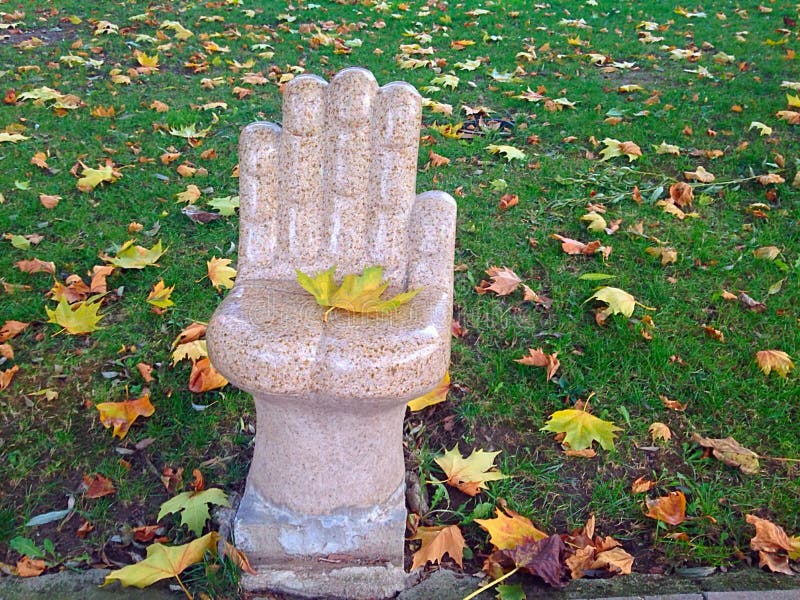 Hand statue with leaf stock photo. Image of statue, amazing - 79709484