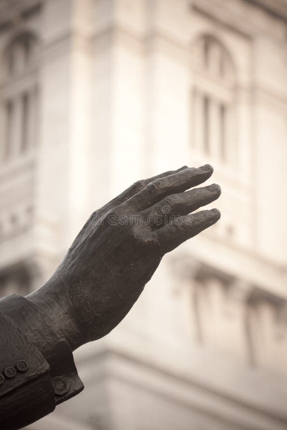 Hand on Statue Raised in Greeting Stock Photo - Image of policeman ...