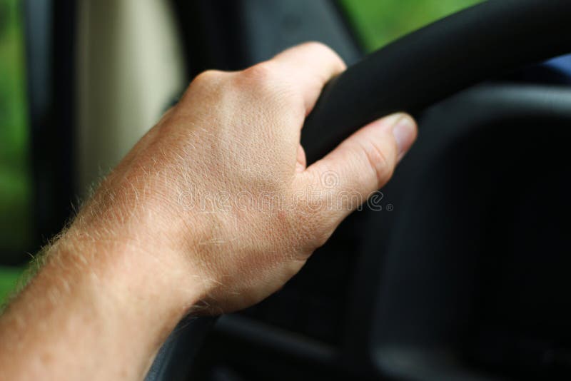 The Hand on the Steering Wheel of the Car Close-up Stock Image - Image ...