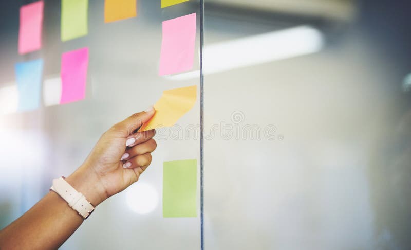 Hand, Sticky Note and Glass Wall for Brainstorming Solution for Tech ...
