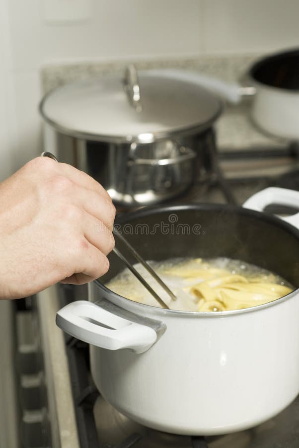 Hand Stirring Noodles stock image. Image of cooking, student - 7138559