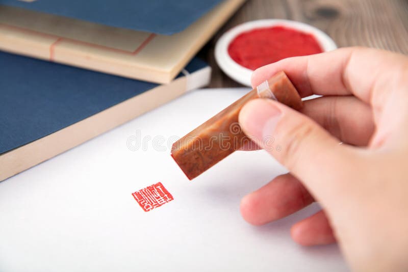 Hand the Stone Seal on the White Pape Stock Image - Image of book ...