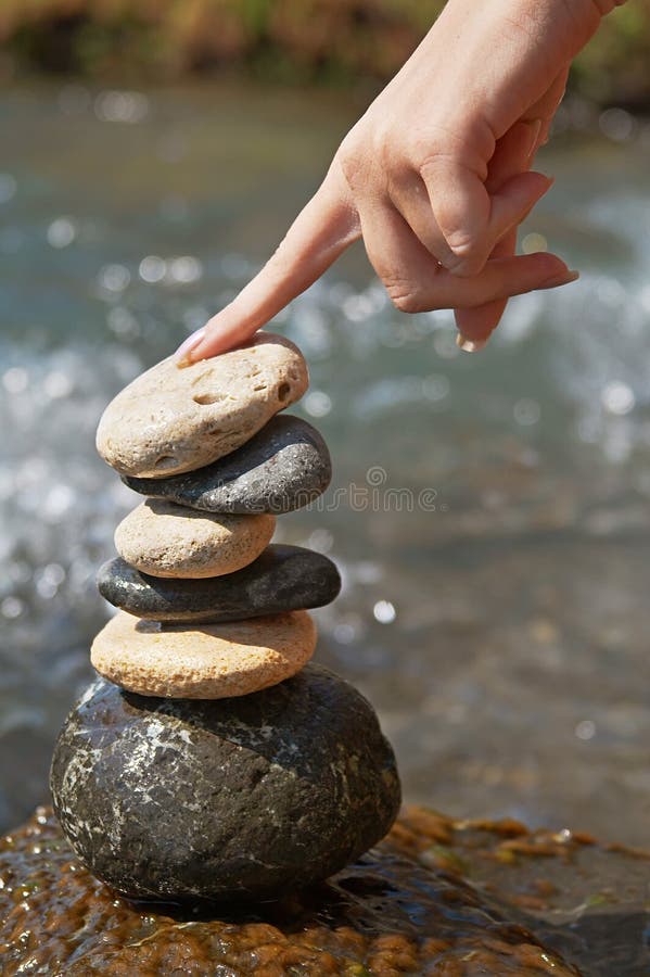 Hand and stones stock image. Image of finger, hand, alternation - 10801755
