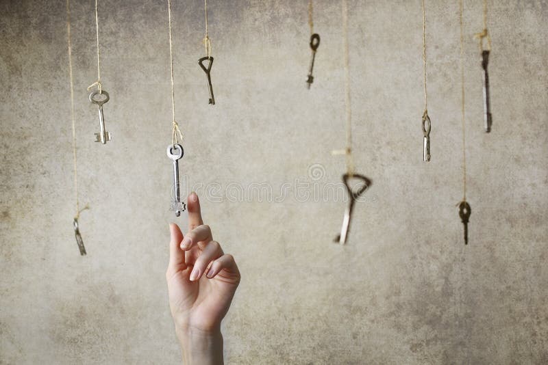 Hand Stretching for One of the Many Old Vintage Keys Stock Photo ...