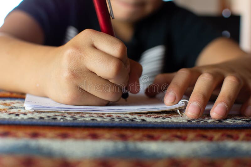 Hand of Student Doing the Homework for the School Stock Photo - Image ...