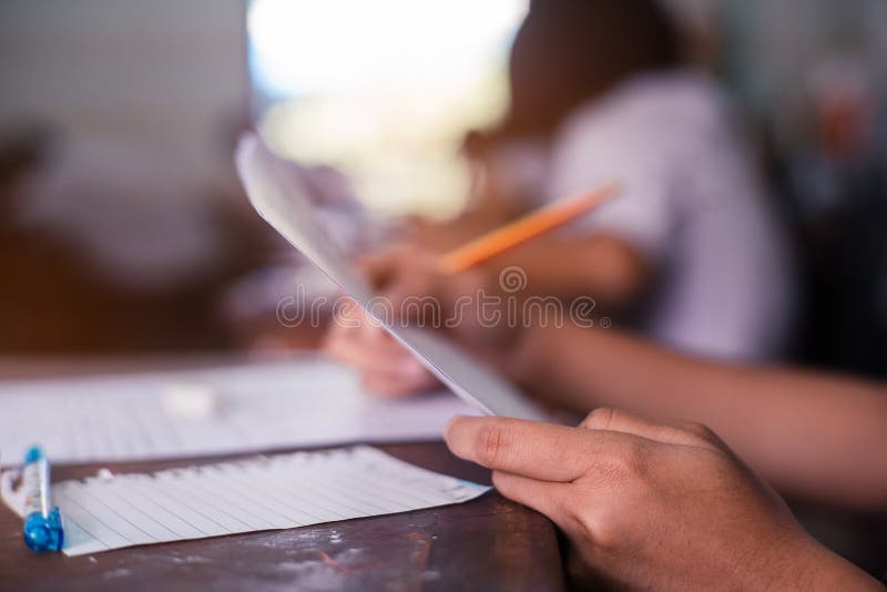 Hand of Student Doing Test or Exam in Classroom of School with Stress ...