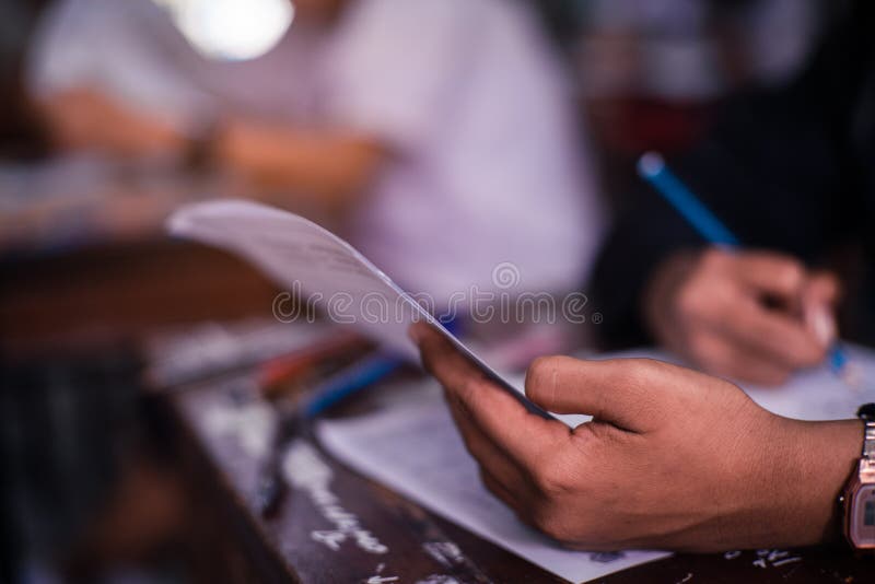 Hand of Student Doing Test or Exam in Classroom of School with Stress ...