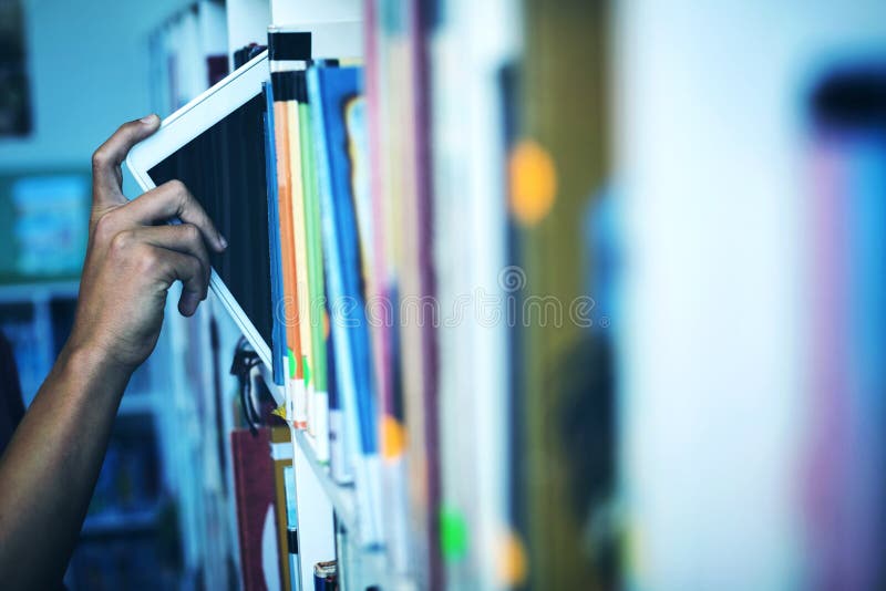 Hand of Student Keeping Digital Tablet in Bookshelf in Library Stock ...