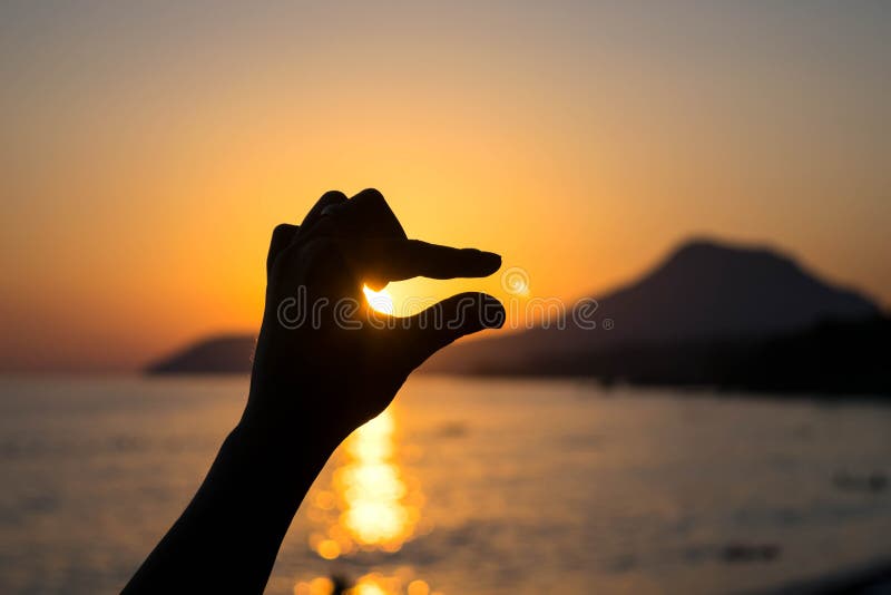 Hand on sunset stock image. Image of contrasts, beauty - 144398703