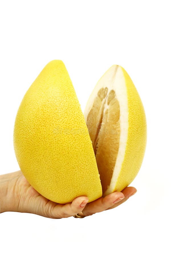 Hand Supporting a Pomelo Fruit Cut in Half Stock Photo - Image of white ...