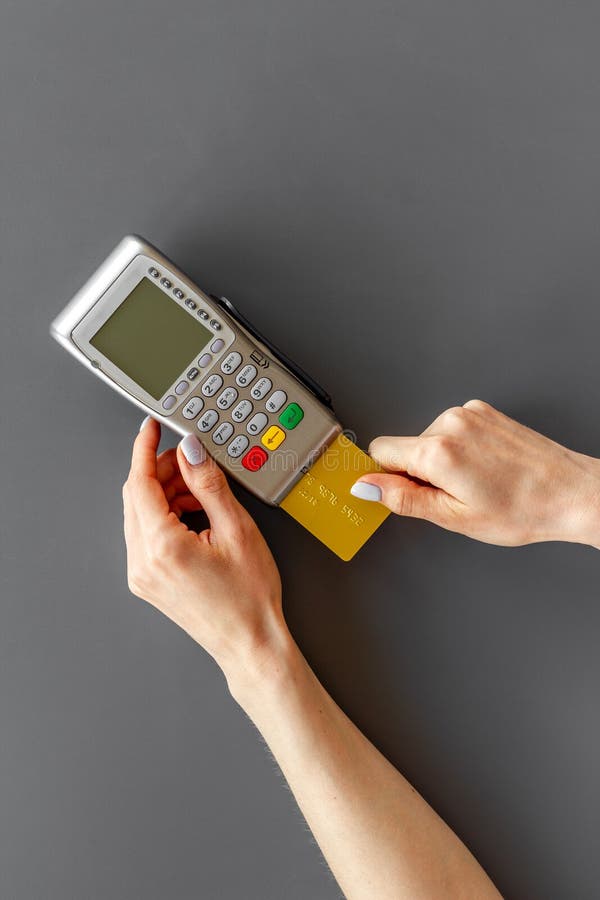 Hand Swiping Credit Card by Pos Terminal. Payment Transactions Concept ... Hand Swiping Credit Card by Pos Terminal. Payment Transactions Concept ...