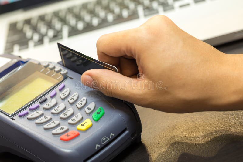 Hand Swiping Credit Card stock photo. Image of card, close - 62091156