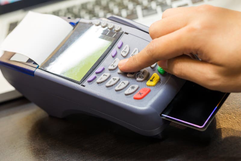 Hand Swiping Credit Card stock image. Image of holding - 62091227