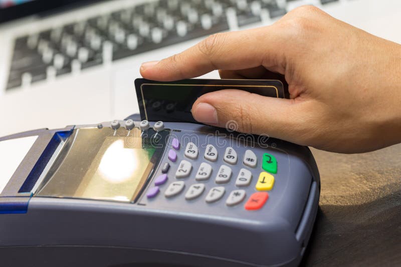 Hand Swiping Credit Card stock photo. Image of magnetic - 62826838