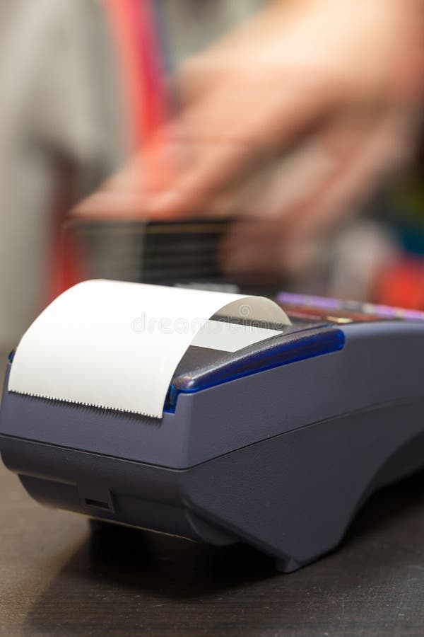 Hand Swiping Credit Card stock photo. Image of paying - 62826864