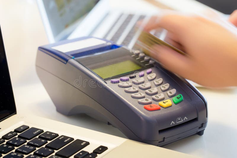 Hand Swiping Credit Card stock image. Image of close - 62837765