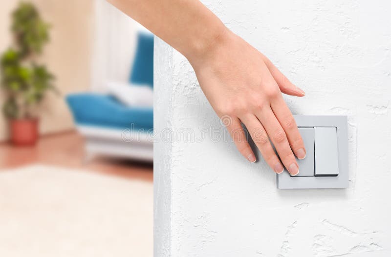 Hand on the switch stock photo. Image of home, panel - 270744168