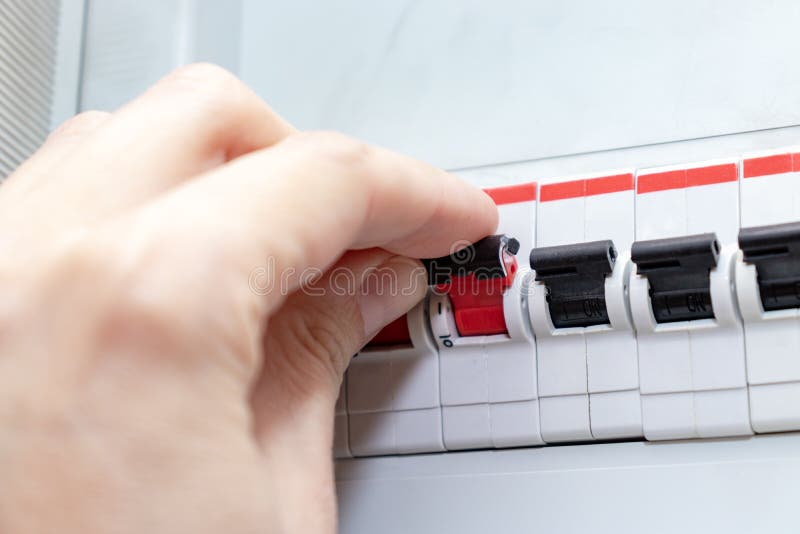 Hand Switching the Automatic Switches of Electricity in the House ...