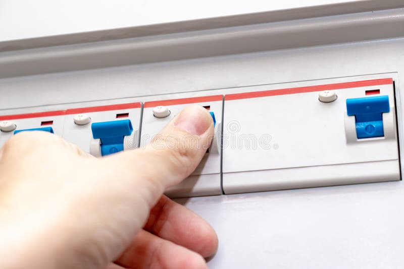 Hand Switching the Automatic Switches of Electricity in the House ...