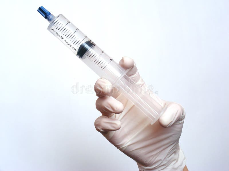 Hand with syringe stock image. Image of surgical, dose - 12949461