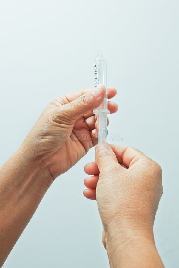 Hand with syringe. stock photo. Image of care, therapy - 47349792