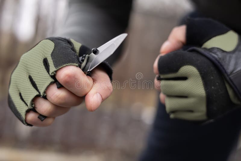 Hand in Tactical Glove, Holding Folding Knife, Close Up Stock Image ...
