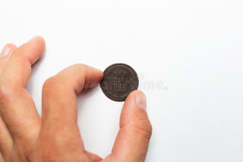 Hand Take Ancient Coin of 1865 from White Background. Stock Photo ...