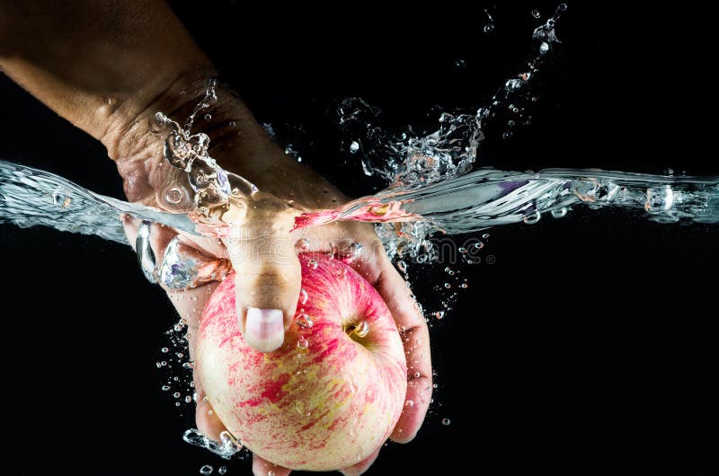 Hand Take Up Apple Splashing in Water. Stock Image - Image of aqueous ...