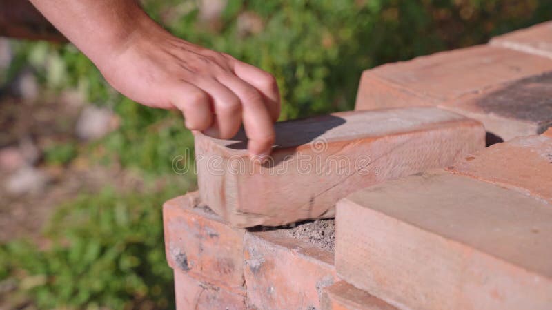 Worker Lifts Old Brick from Pile Onto Cobwebbed Hands Close-up DIY ...