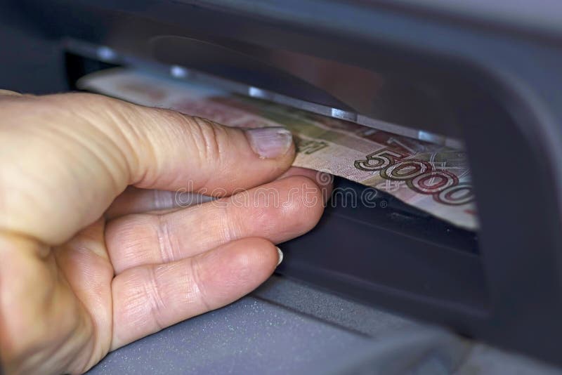 The Hand Takes a Paper Money from the Open ATM Receiver Stock Image ...