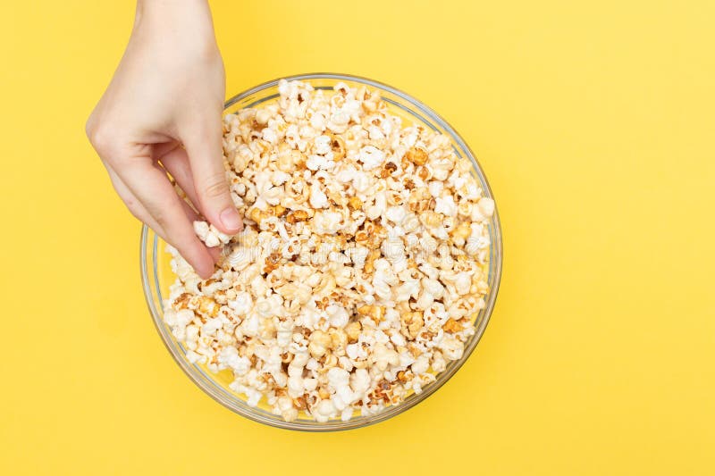 Hand Takes Popcorn from Bowl Stock Photo - Image of corn, salty: 269906240