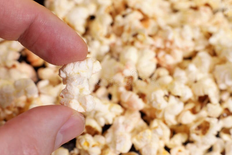 Hand Takes Popcorn from a Paper Box Stock Image - Image of stripes ...