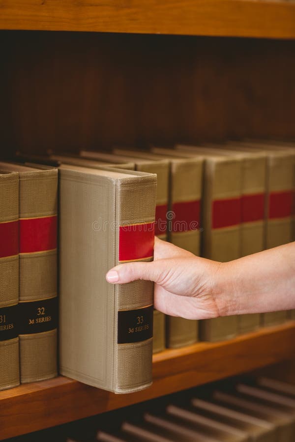 Hand Taking a Book from Bookshelf Stock Image - Image of textbook, book ...