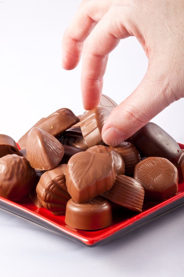 Boy grabbing chocolate stock image. Image of naughty, finger - 7971667