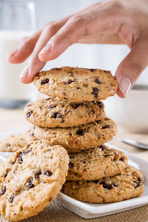 Hand taking cookie stock photo. Image of close, baked - 63824092