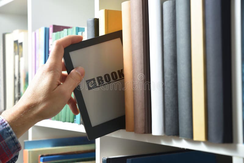 Hand Taking an Ebook from a Shelf Full of Books Stock Photo - Image of ...