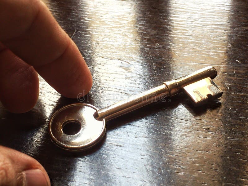 Hand Taking a Key on the Table Concept Stock Image - Image of close ...