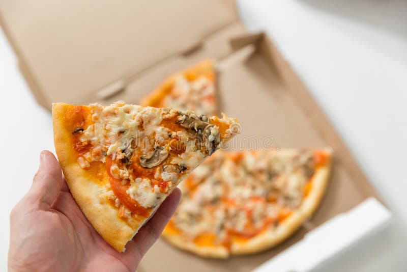 Hand Taking Last Slice of Pizza from Delivery Box Stock Image - Image ...