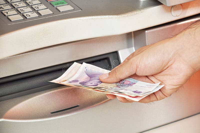 Hand taking money from ATM stock photo. Image of financial - 37675280