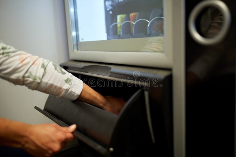 Hand Taking Purchase from Vending Machine Stock Image - Image of ...