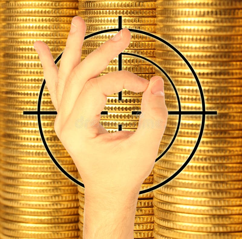 Hand and Target Against Coins of Yellow Metal Stock Image - Image of ...