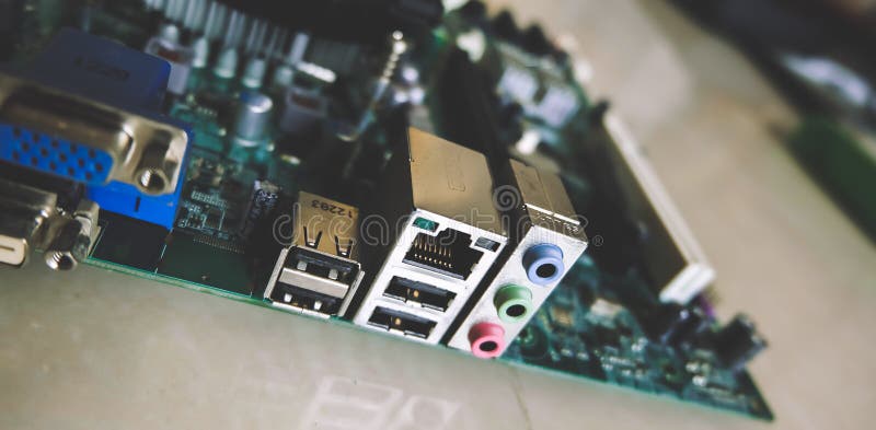 Hand of Technician Operator Assembling the CPU into Computer Mainboard ...